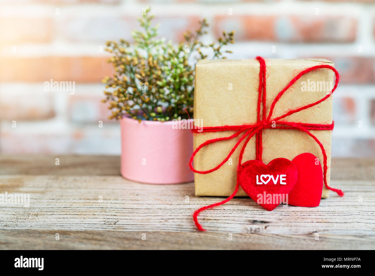 Heart shape with LOVE word, Gift box, and flower, copy space for ...