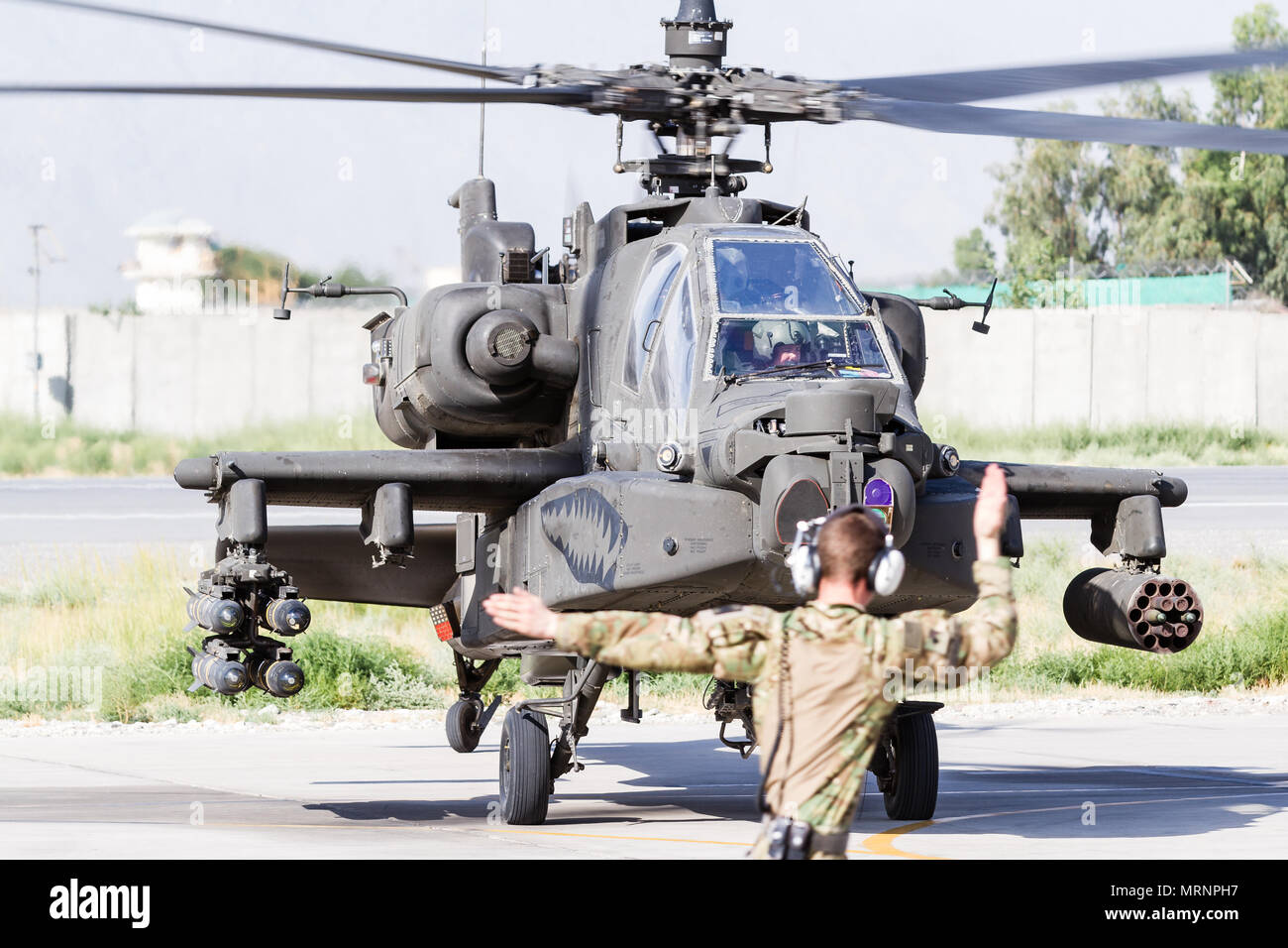 A U.S. Army AH-64E Apache helicopter crew chief assigned to Task Force ...