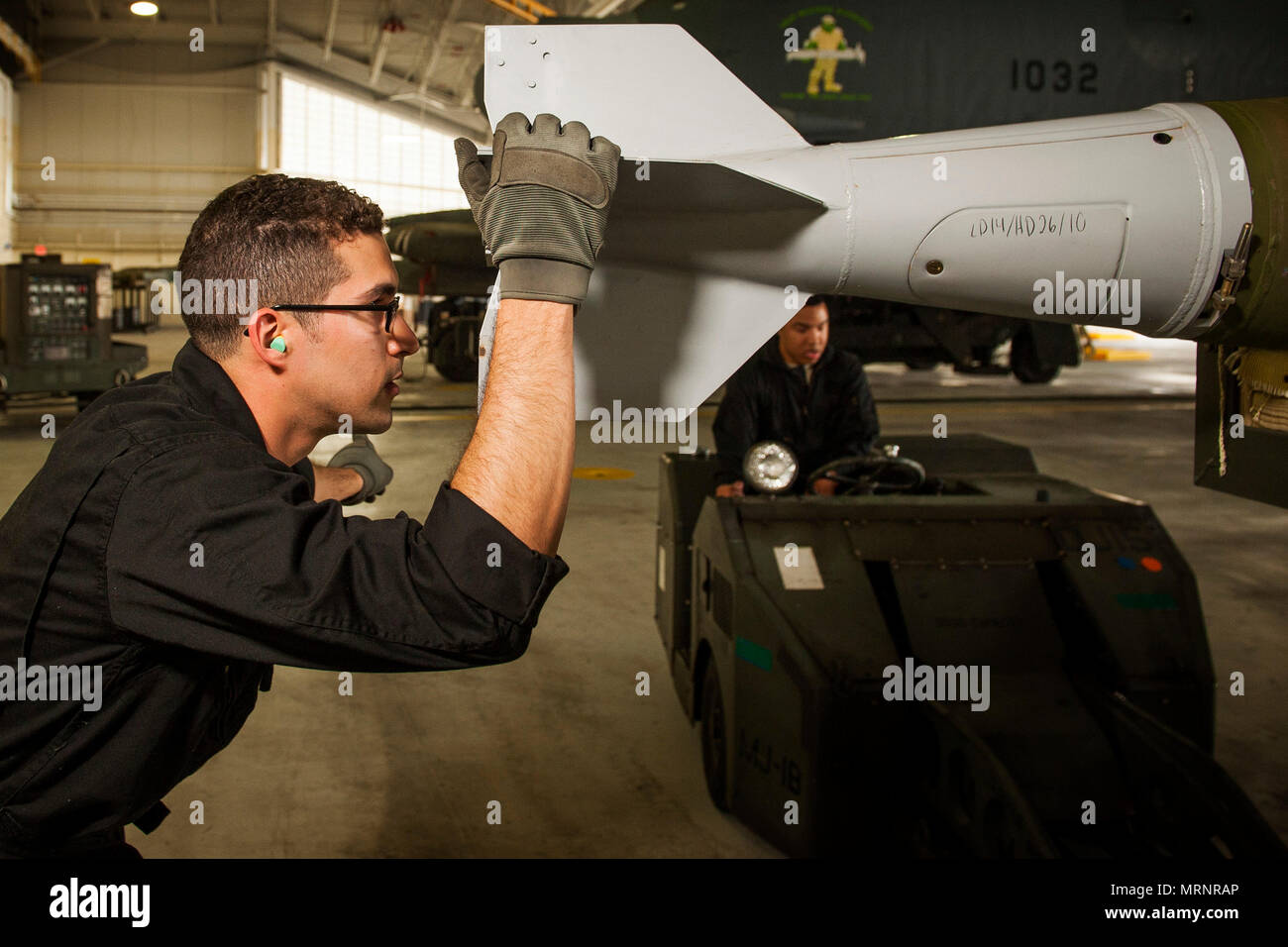 Staff Sgt. Alex Jimenez, 5th Aircraft Maintenance Squadron weapons load ...