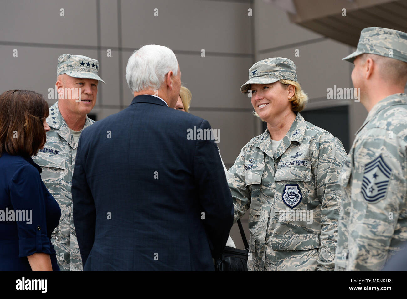 Vice President Mike Pence shakes hands with Col. Deanna Burt, 50th ...