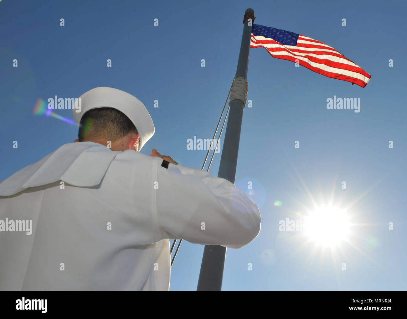 170626-N-BD308-015 NORFOLK (June 26, 2017) Seaman Tyler Pickett salutes ...