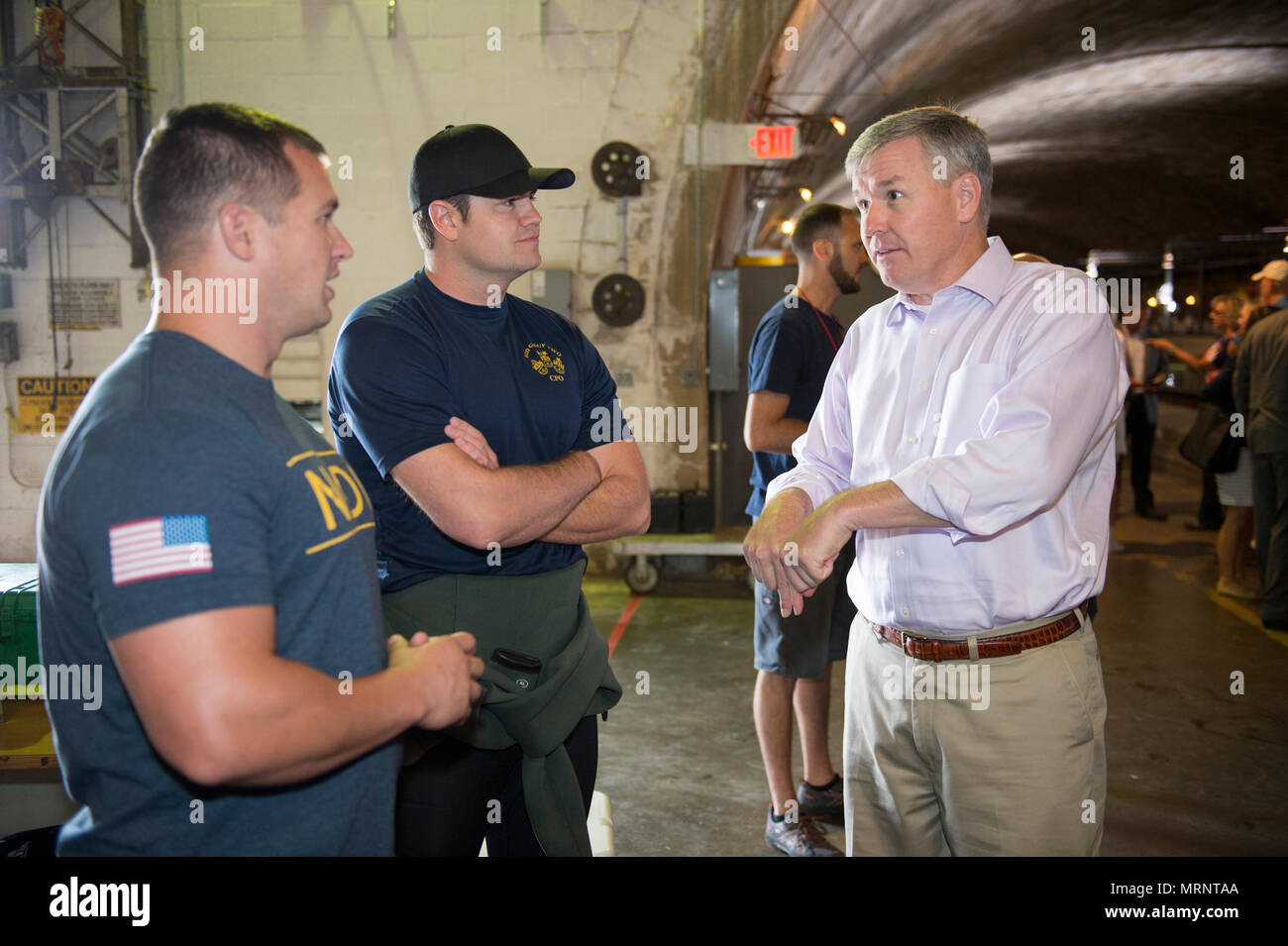 Chief Navy Diver Justin Griffin and Navy Diver 1st Class Stephen Eide ...