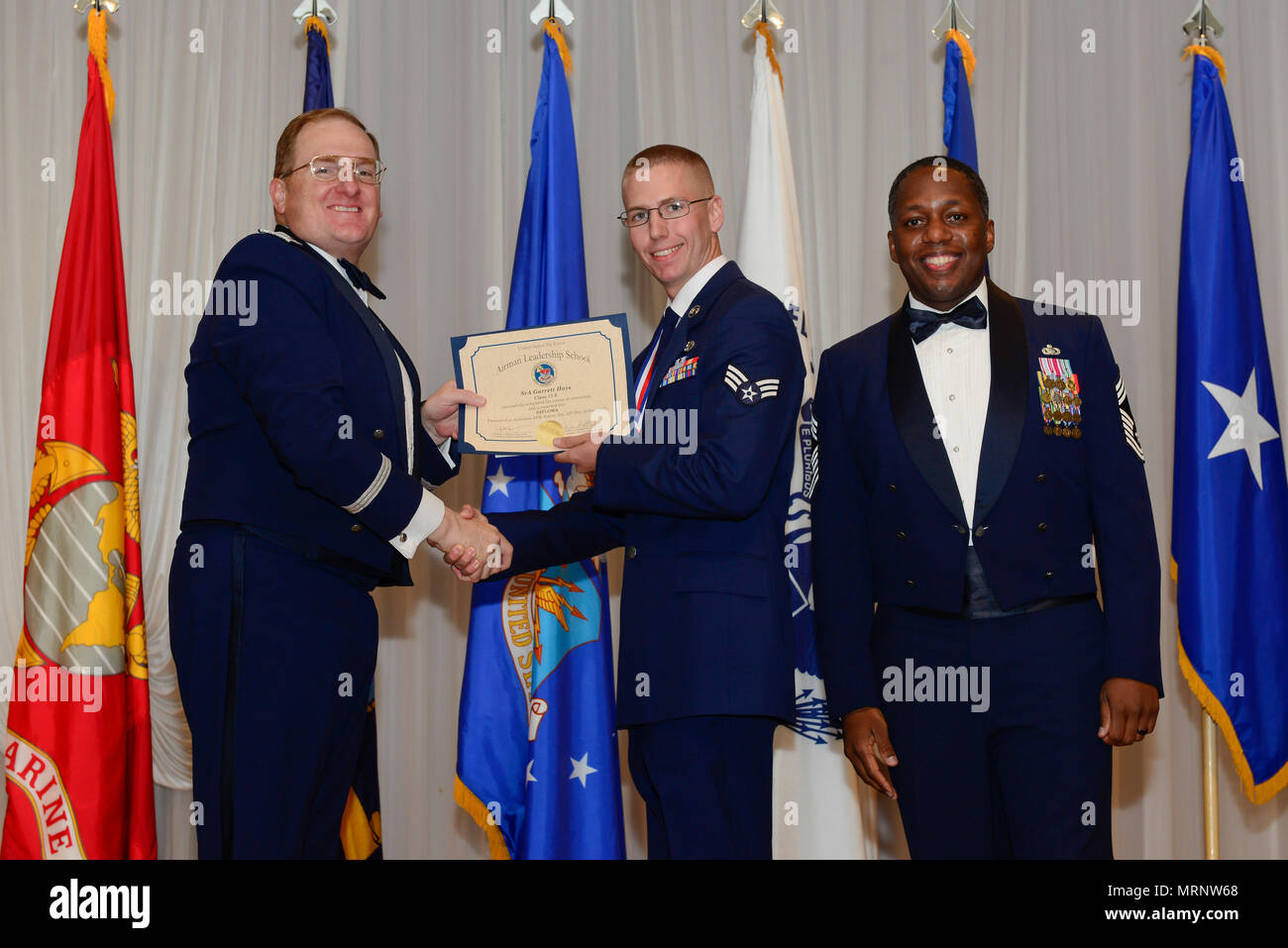 U.S. Air Force Senior Airman Garrett Hays receives his graduation ...