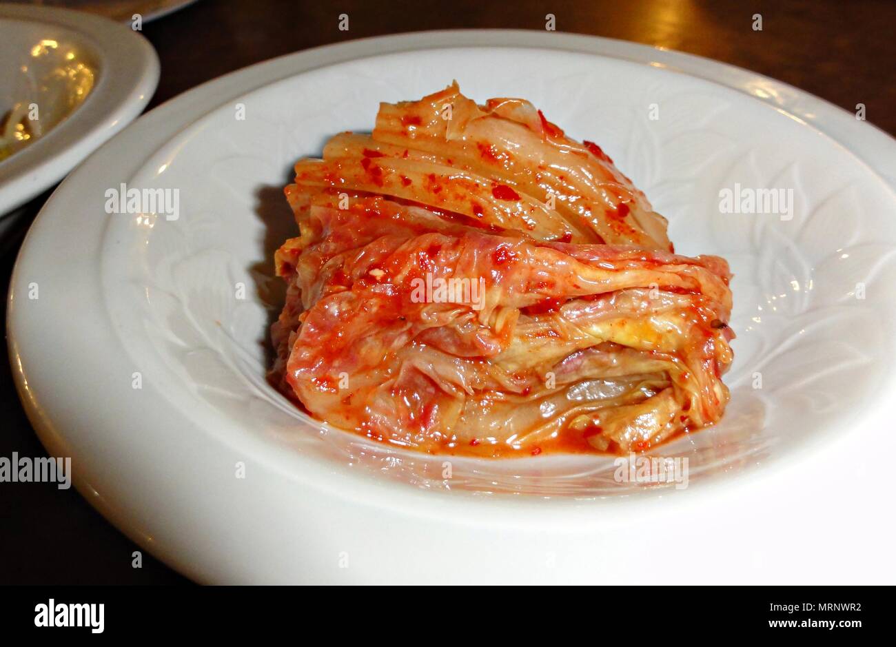 Kimchi, a traditional Korean side dish made from salted and fermented ...
