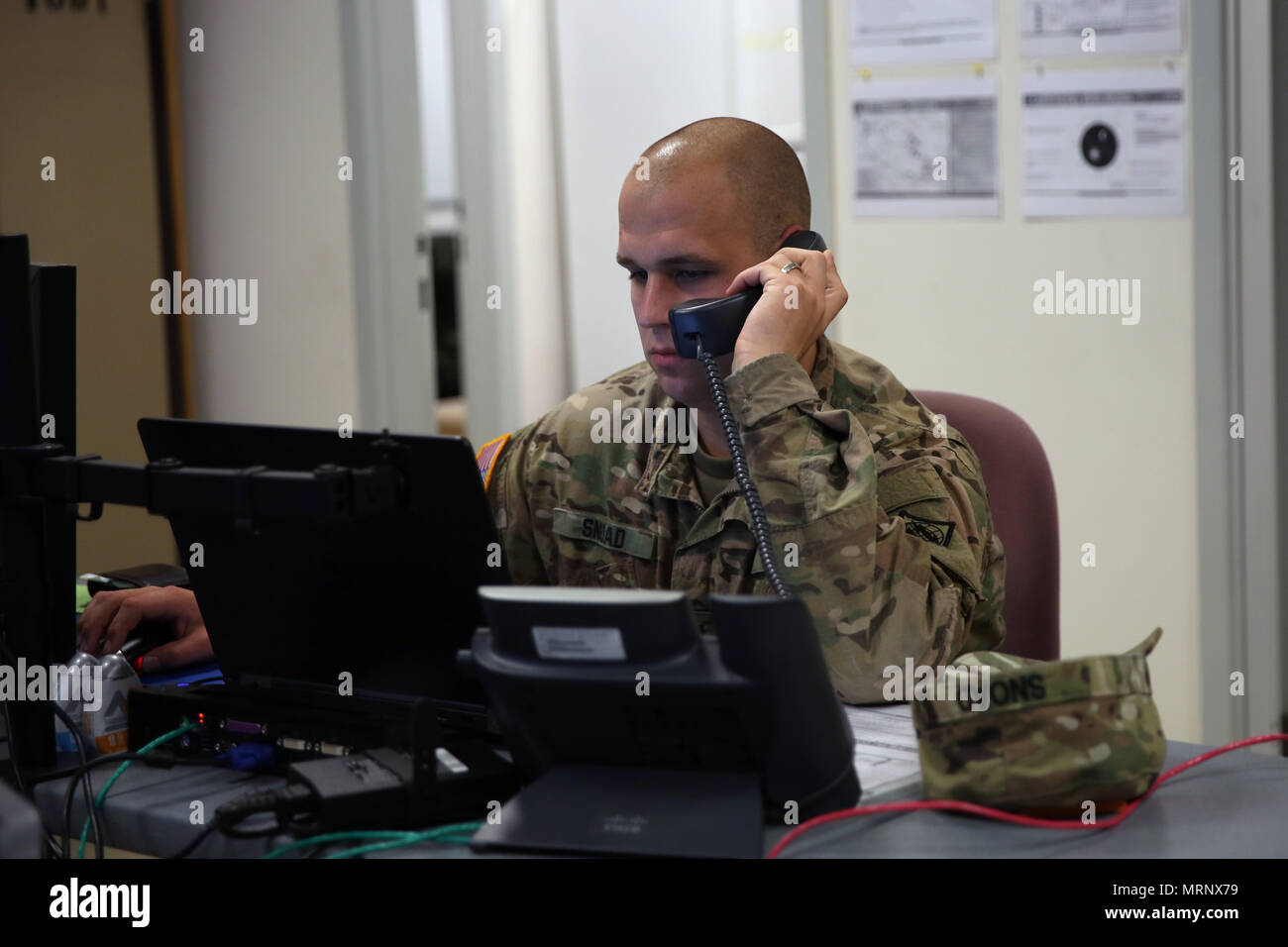 U.S. Army Capt. Nick Snoad, 44th Expeditionary Signal Bn. assistant S-3 ...