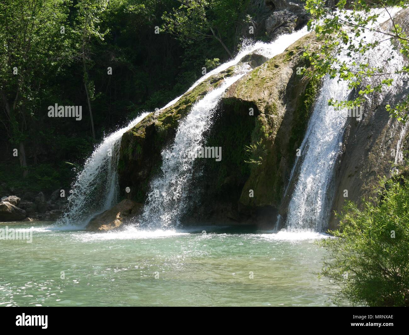 Side view of the waterfalls at Turner Falls Park in Honey Creek ...