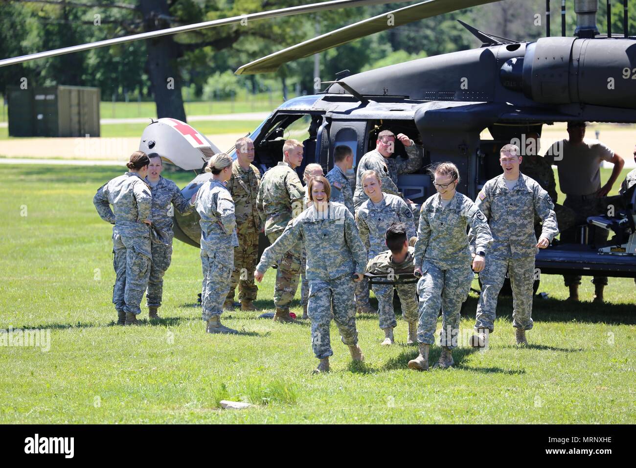 Students at the Medical Simulation Training Center practice loading and ...
