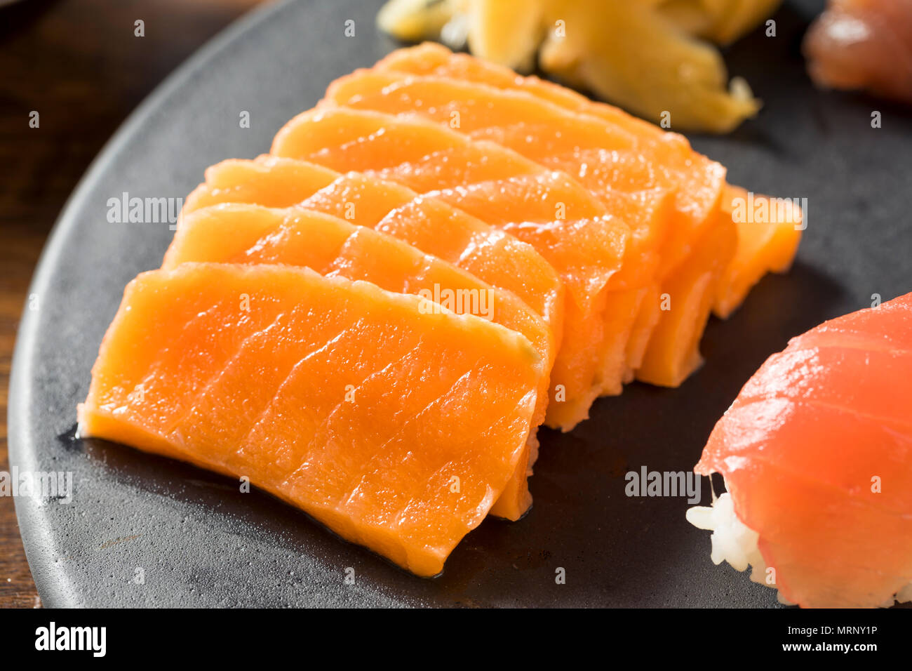 Raw Japanese Salmon Sashimi with Wasabi and Nigiri Stock Photo - Alamy