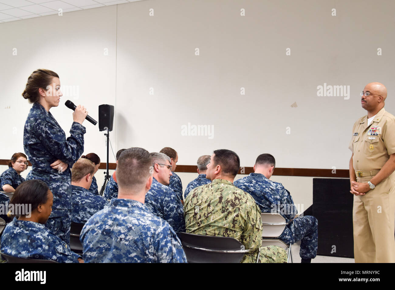 (June 25, 2017) Navy Reserve Force Master Chief C.J. Mitchell listens ...