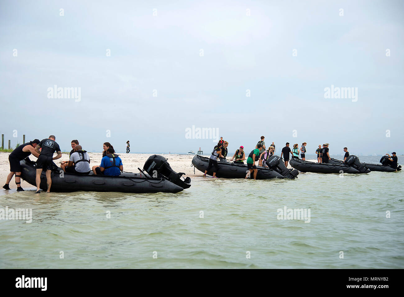 Spouses from Special Operations Command Central arrive on the shore of ...
