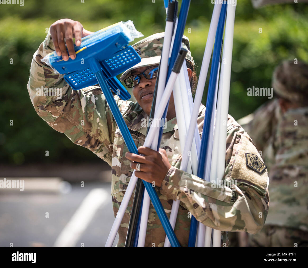 Mops and brooms hi-res stock photography and images - Alamy