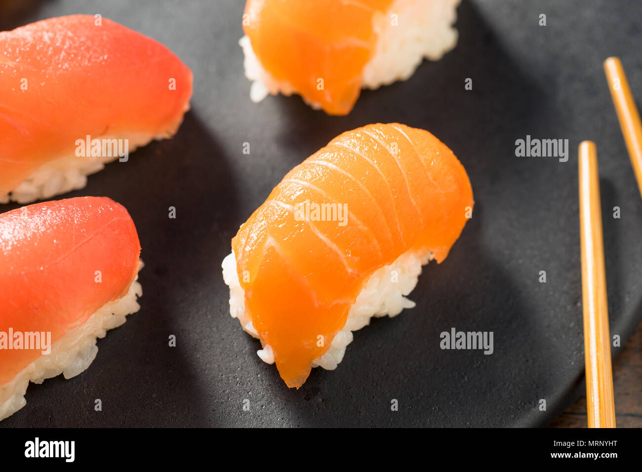 Raw Japanese Salmon Sashimi with Wasabi and Nigiri Stock Photo - Alamy