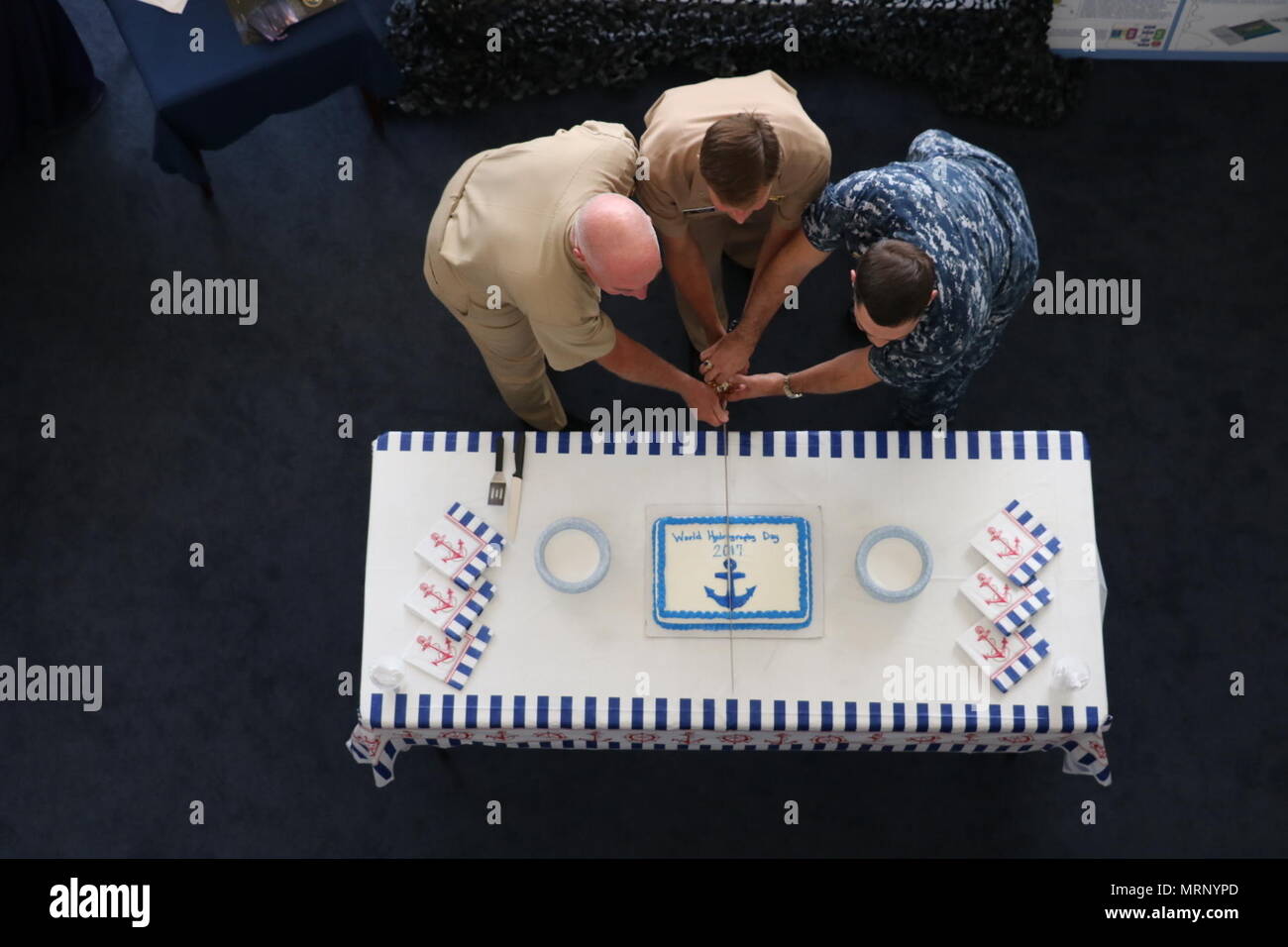 Naval Oceanographic Office Commanding Officer Capt. Greg Ireton (left ...
