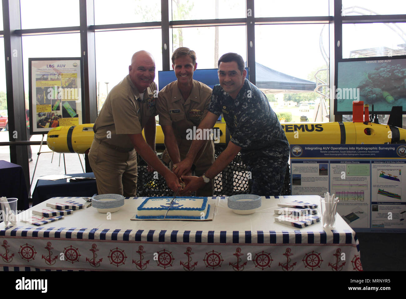 Naval Oceanographic Office Commanding Officer Capt. Greg Ireton (left ...