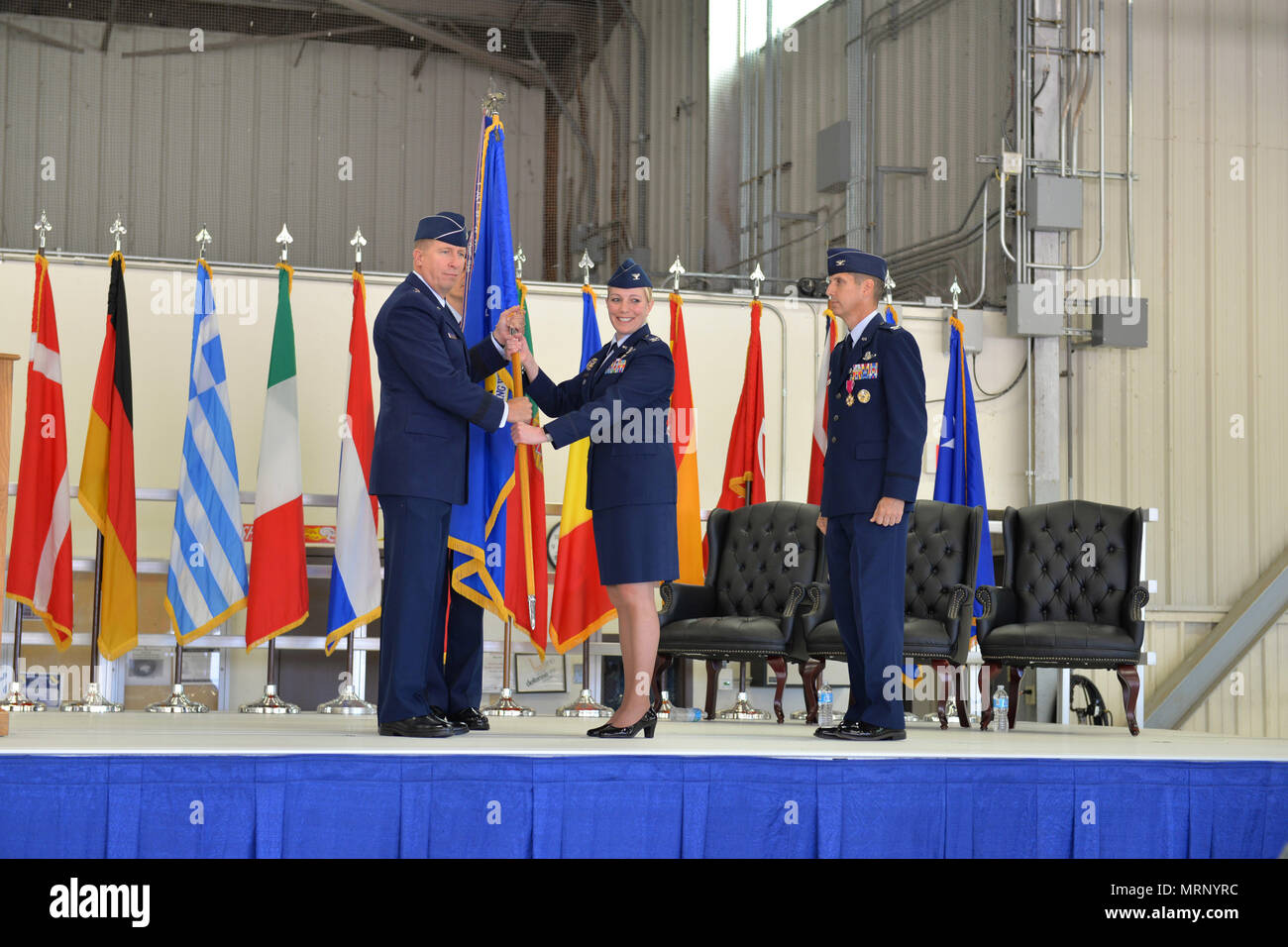 Maj. Gen. Patrick Doherty, 19th Air Force commander, passes the ...