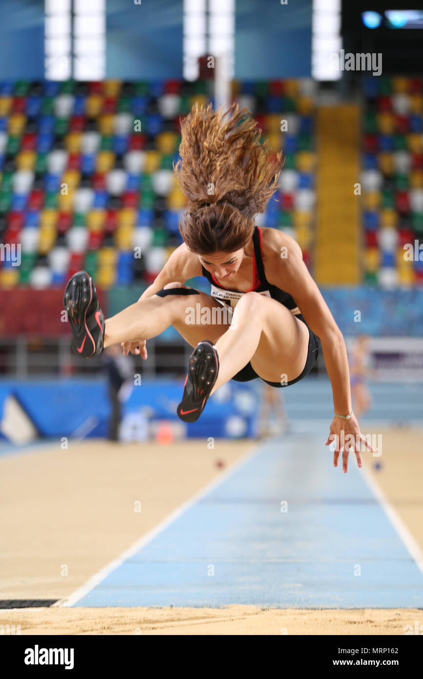 ISTANBUL, TURKEY - FEBRUARY 03, 2018: Undefined athlete triple jumping ...