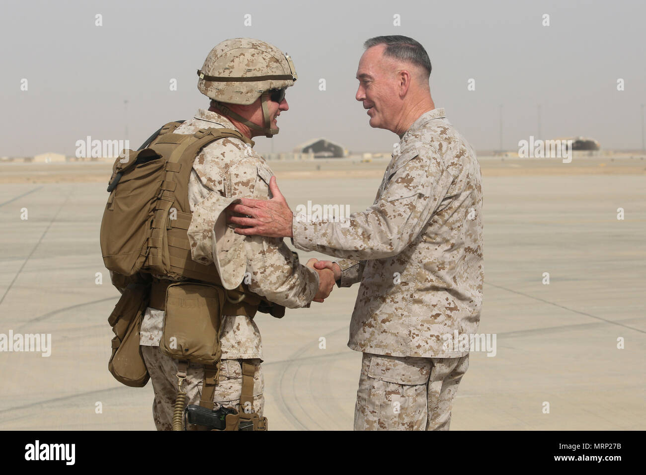 Brig. Gen. Roger Turner, left, the commanding general of Task Force ...