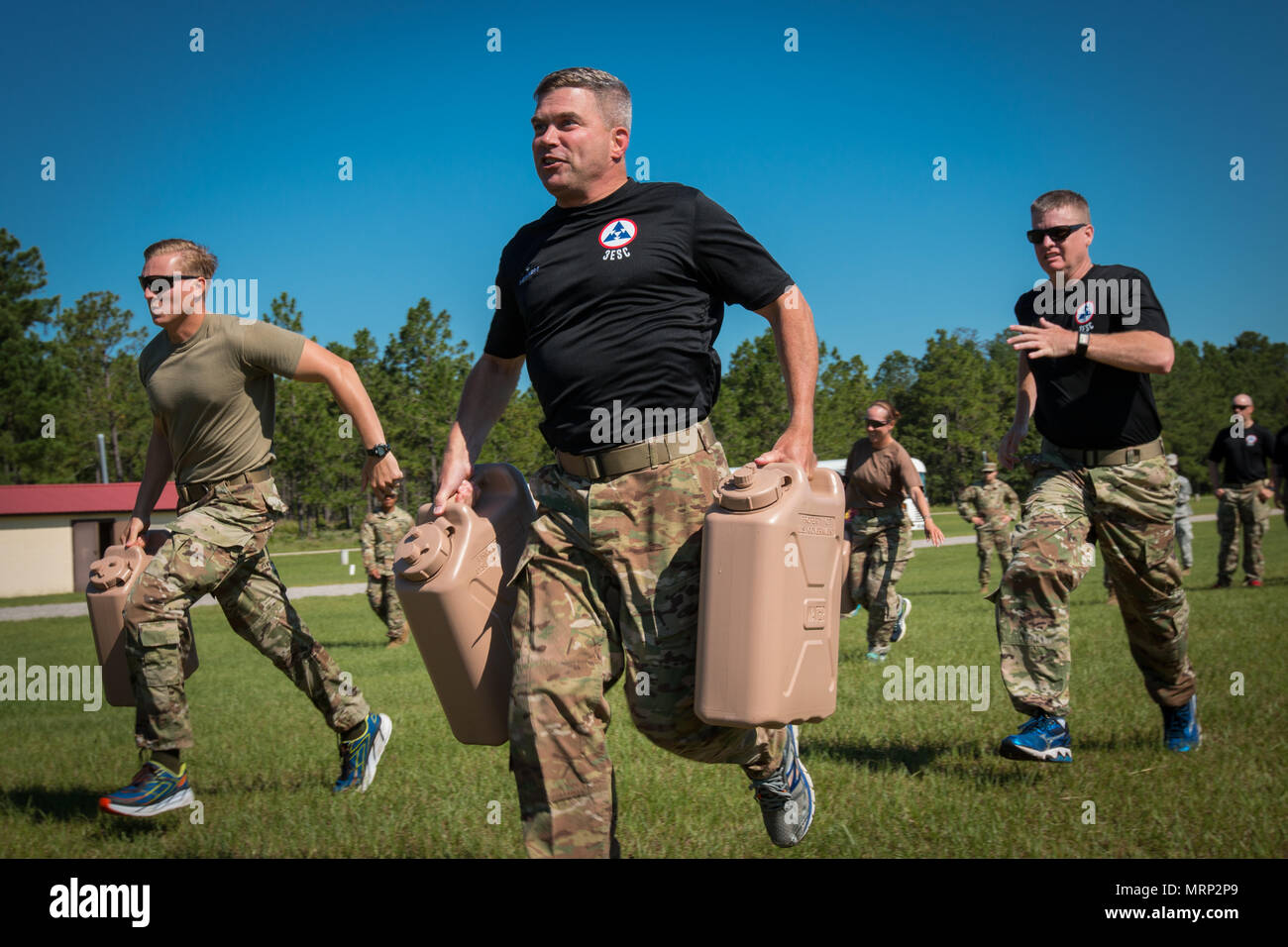Brig. Gen. Christopher J. Sharpsten, (middle), Commander of the 3rd ...
