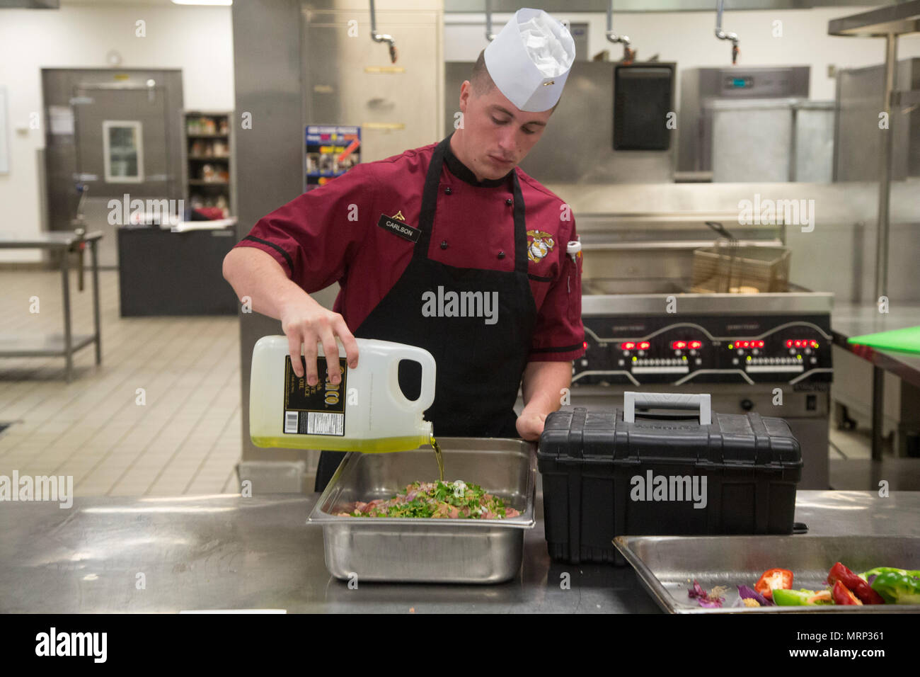 Lance Cpl. Brandon Carlson, Chef of the Quarter participant, readies ...