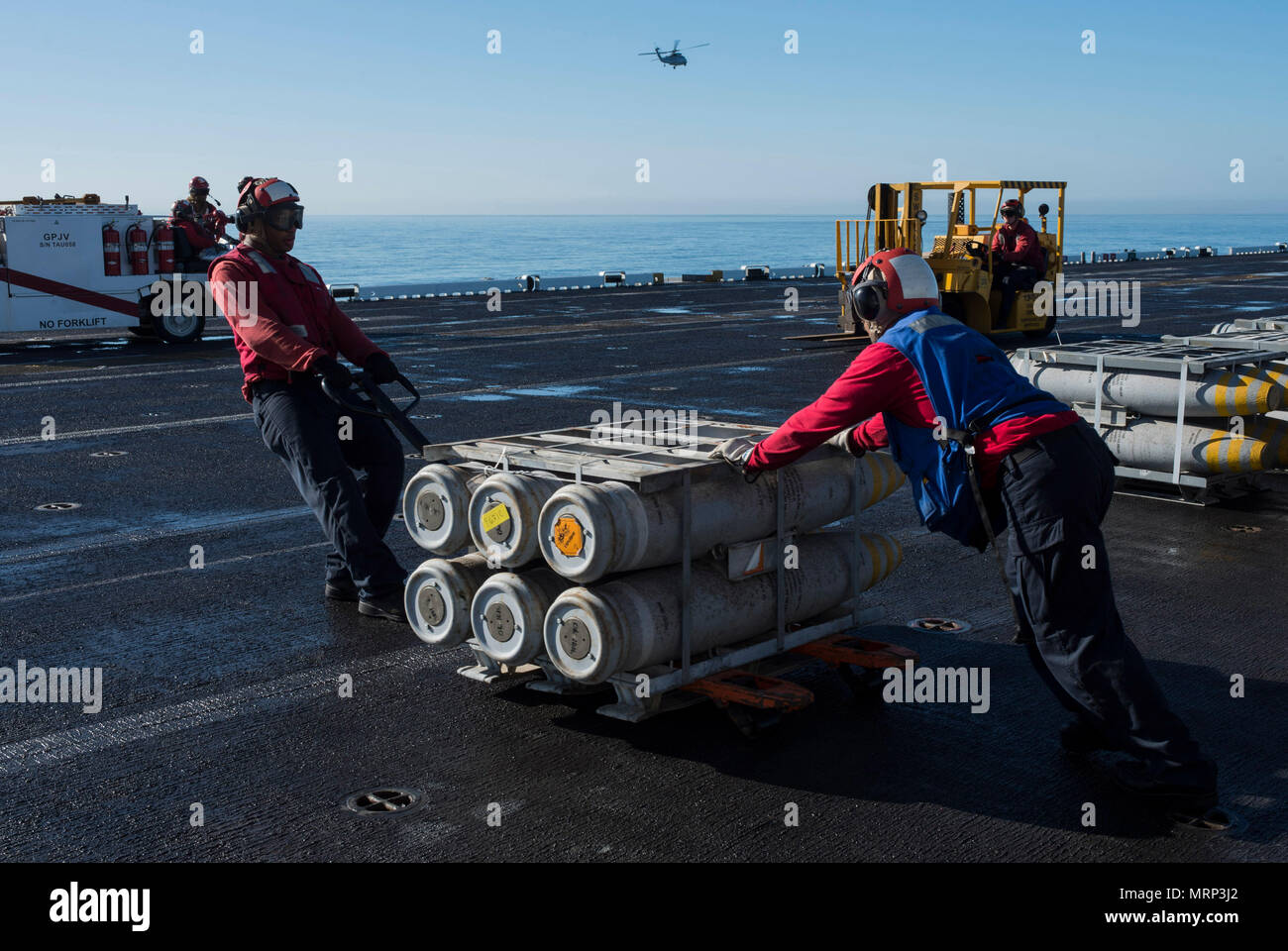 170627-N-AA175-011 PACIFIC OCEAN (June 27, 2017) Aviation Ordnanceman ...