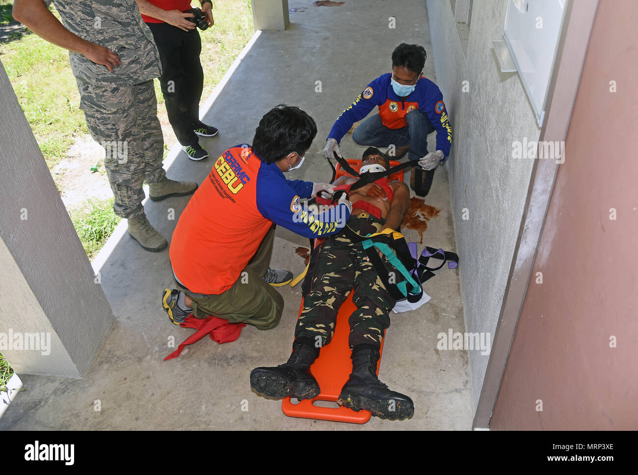 Members of the provincial Disaster Risk Reduction Management Office ...