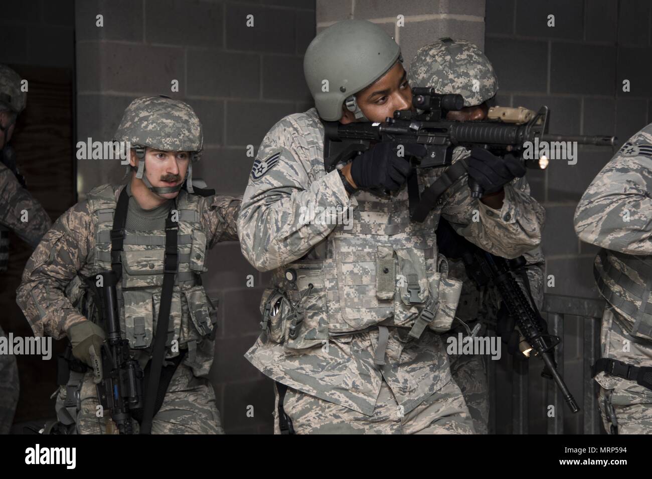 502nd Security and Readiness Group security forces Airmen practice clearing a building June 9 ...