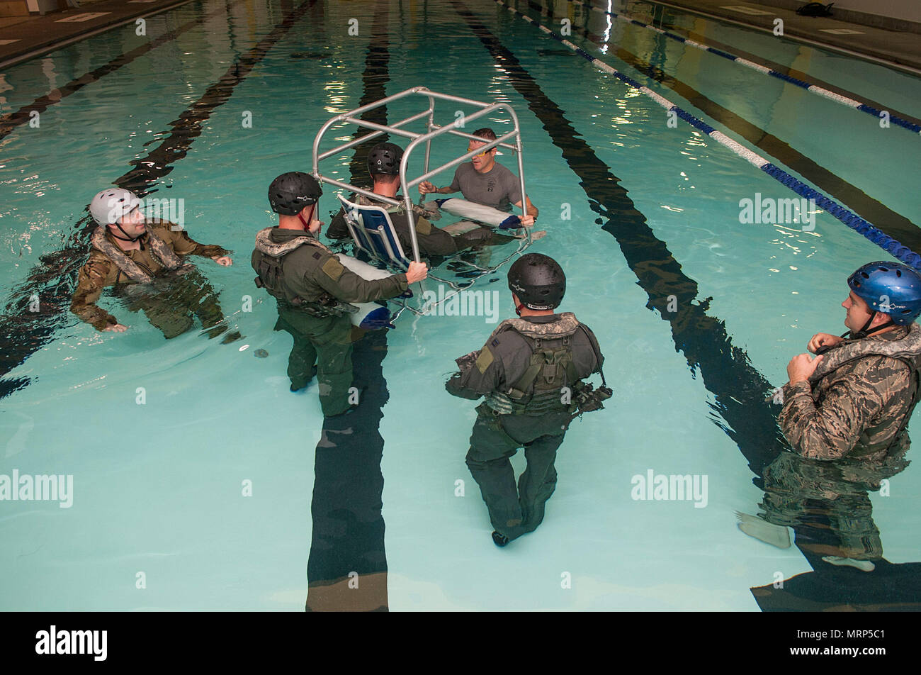 Members of the 54th Helicopter Squadron go through underwater egress ...