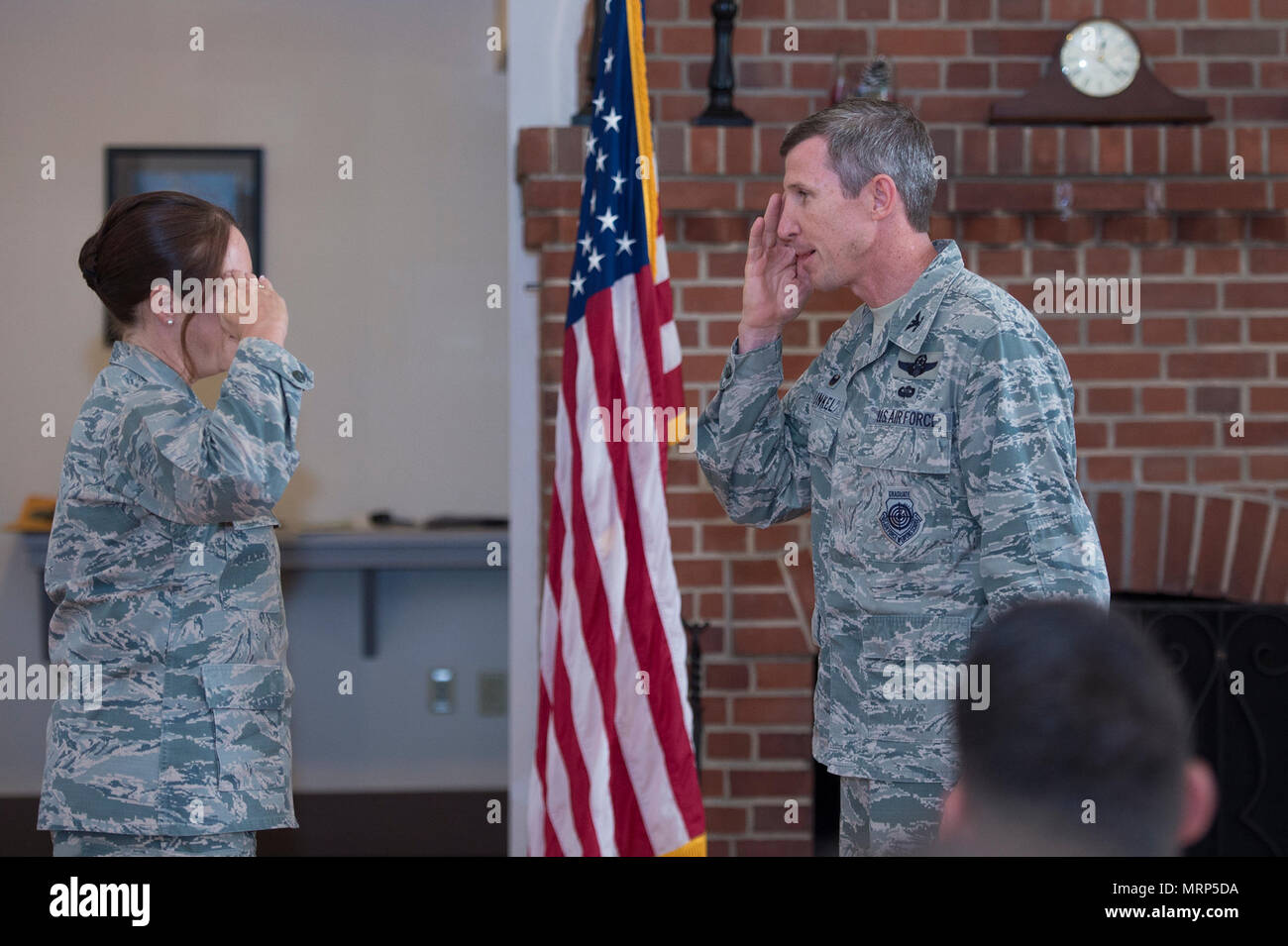 Col. Thomas Kunkel, 23d Wing commander, renders a salute to Lt. Col ...
