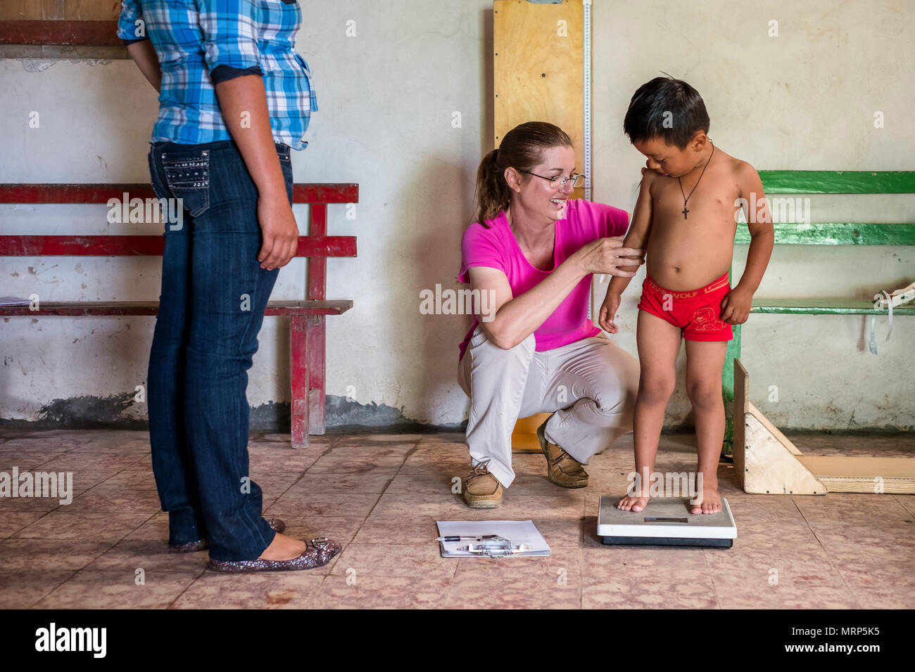 U.S. Army LTC Rhonda Dyer performs anthropometric measurements on a ...