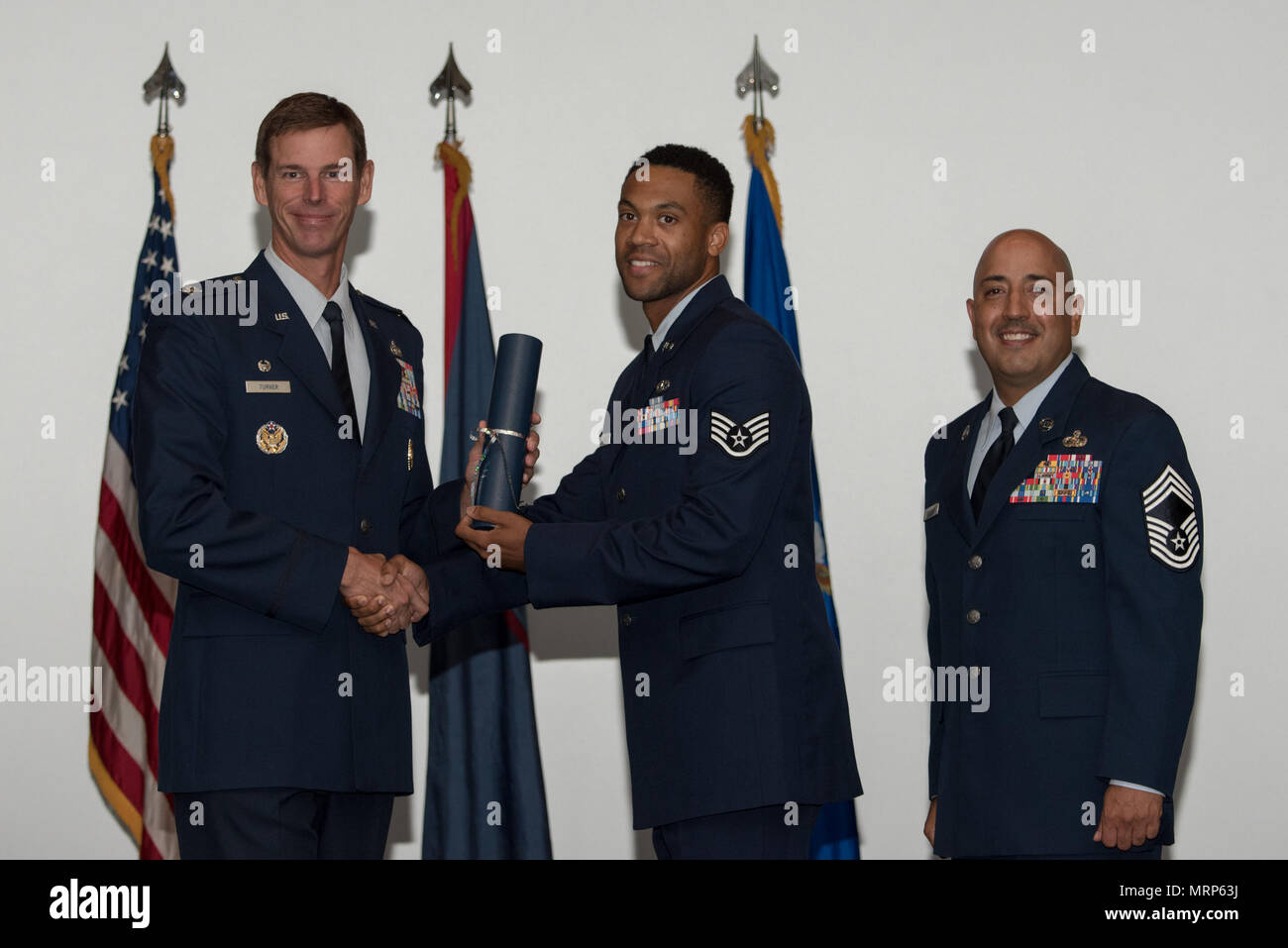 U.S. Air Force Staff Sgt. Justin Long, 554th RED HORSE Squadron, is ...