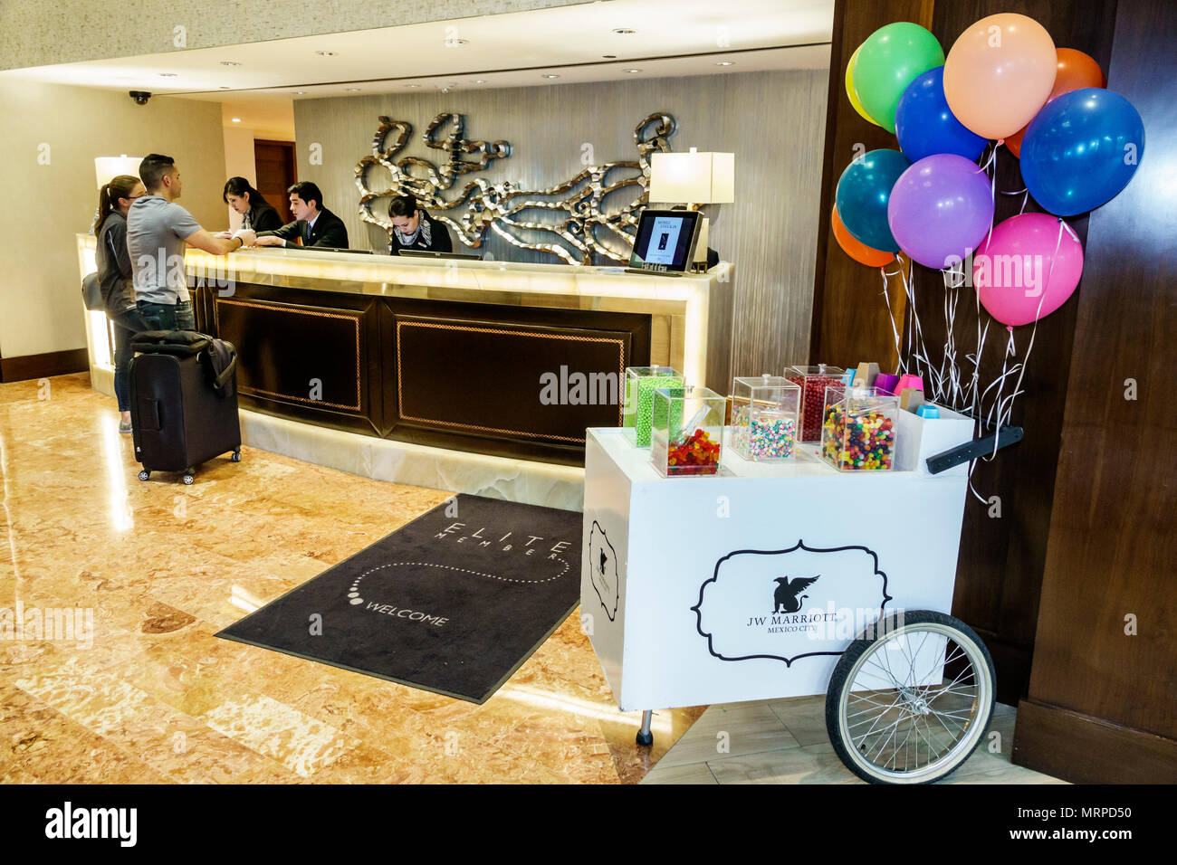 Inside interior lobby front check in reception desk hi-res stock ...