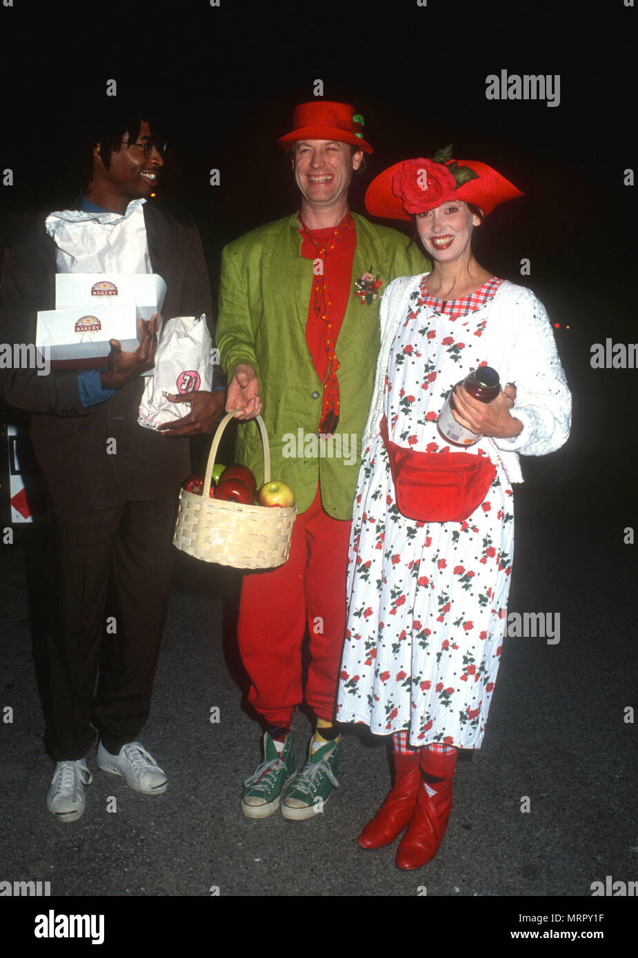 LOS ANGELES, CA - APRIL 13: (L-R) Guest, Screenwriter John Gilroy and ...