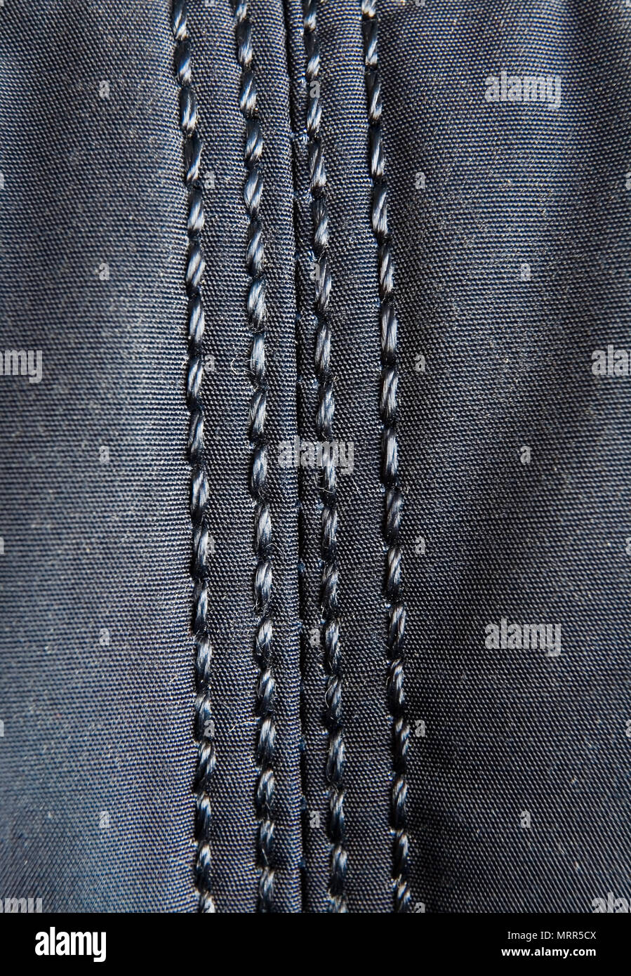 Cloth stitched with threads close-up. Without people Stock Photo - Alamy