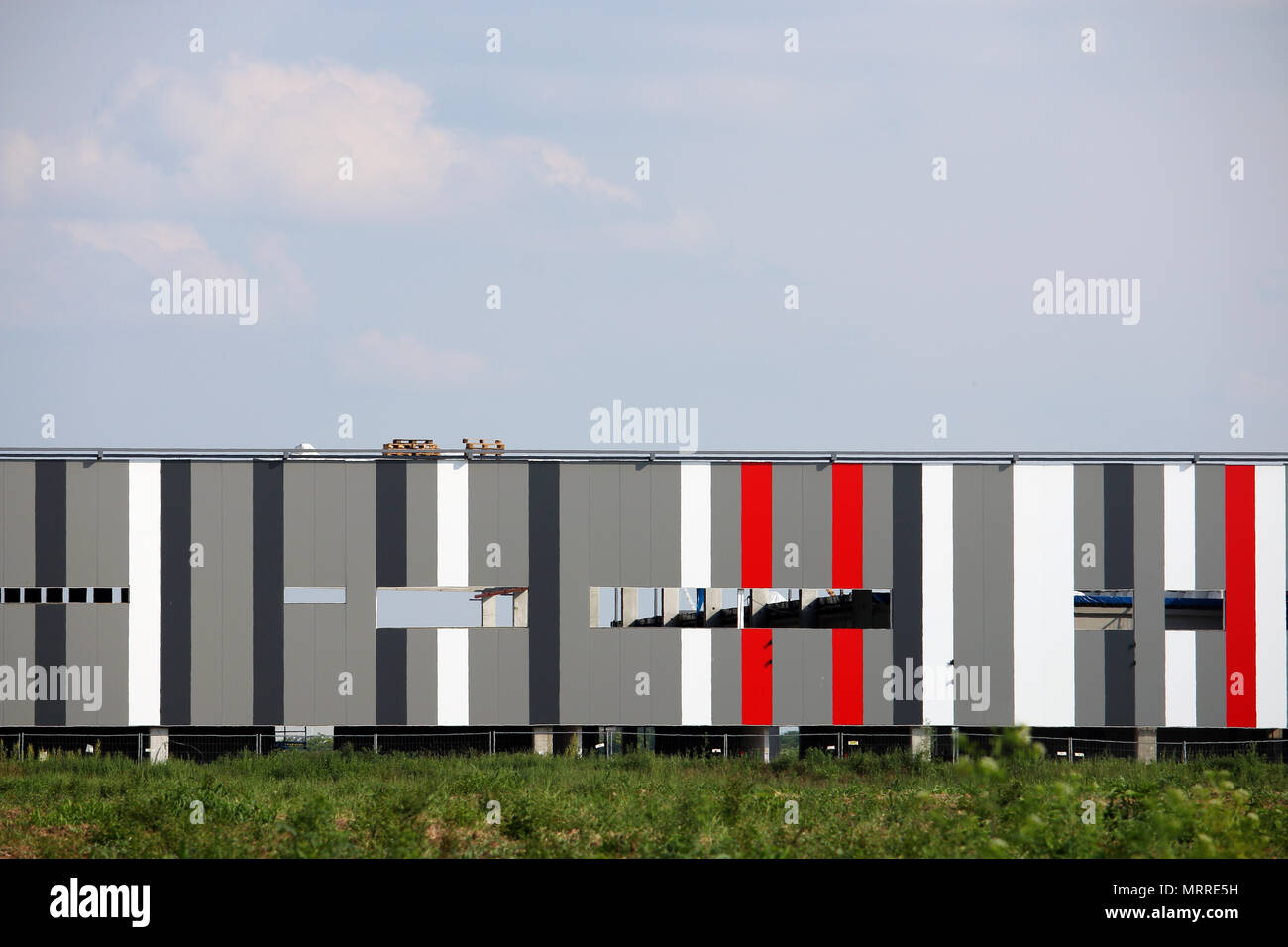 Colorful walls new factory construction site Stock Photo - Alamy