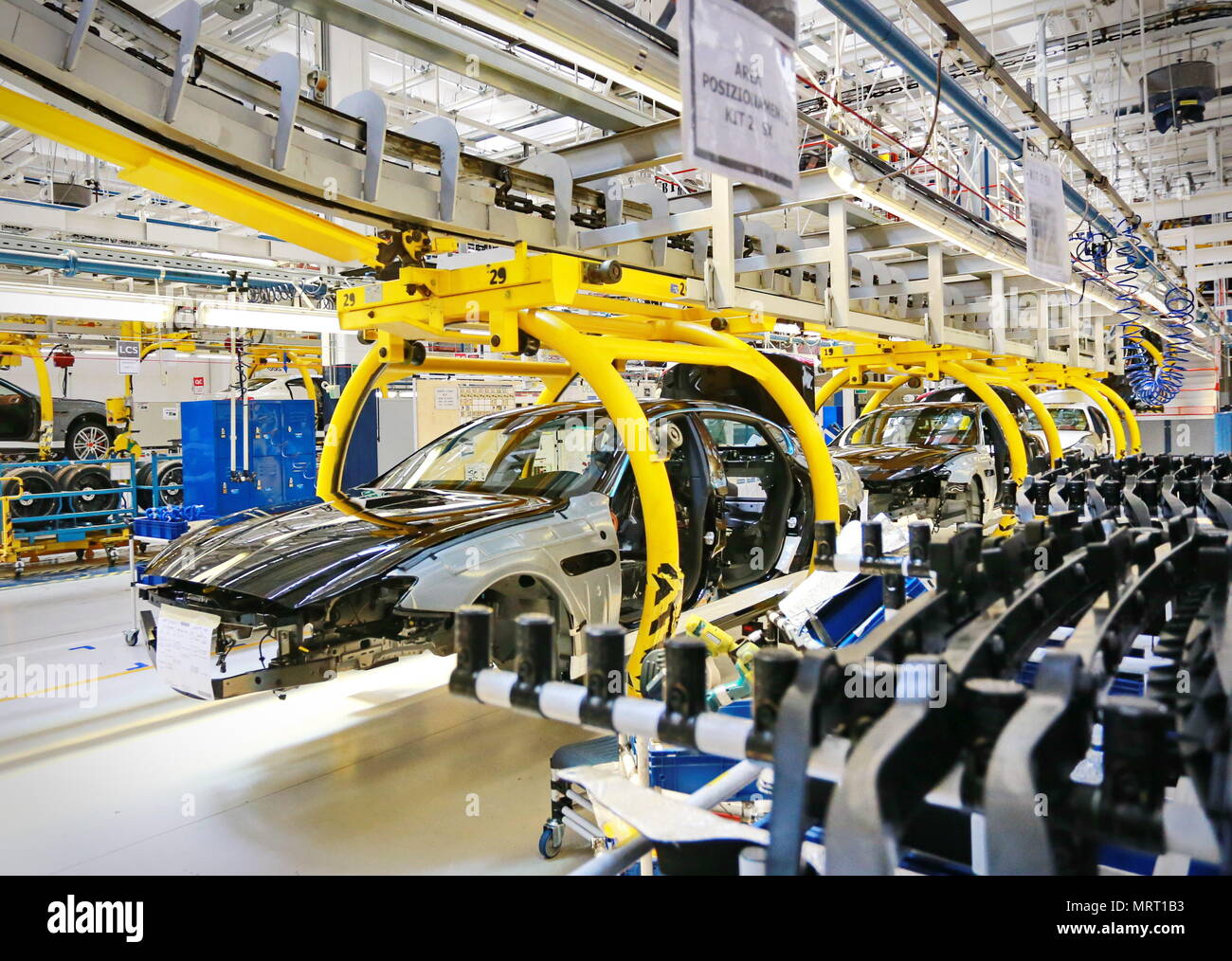 Grugliasco, Italy - June 30, 2014: car production line with unfinished ...