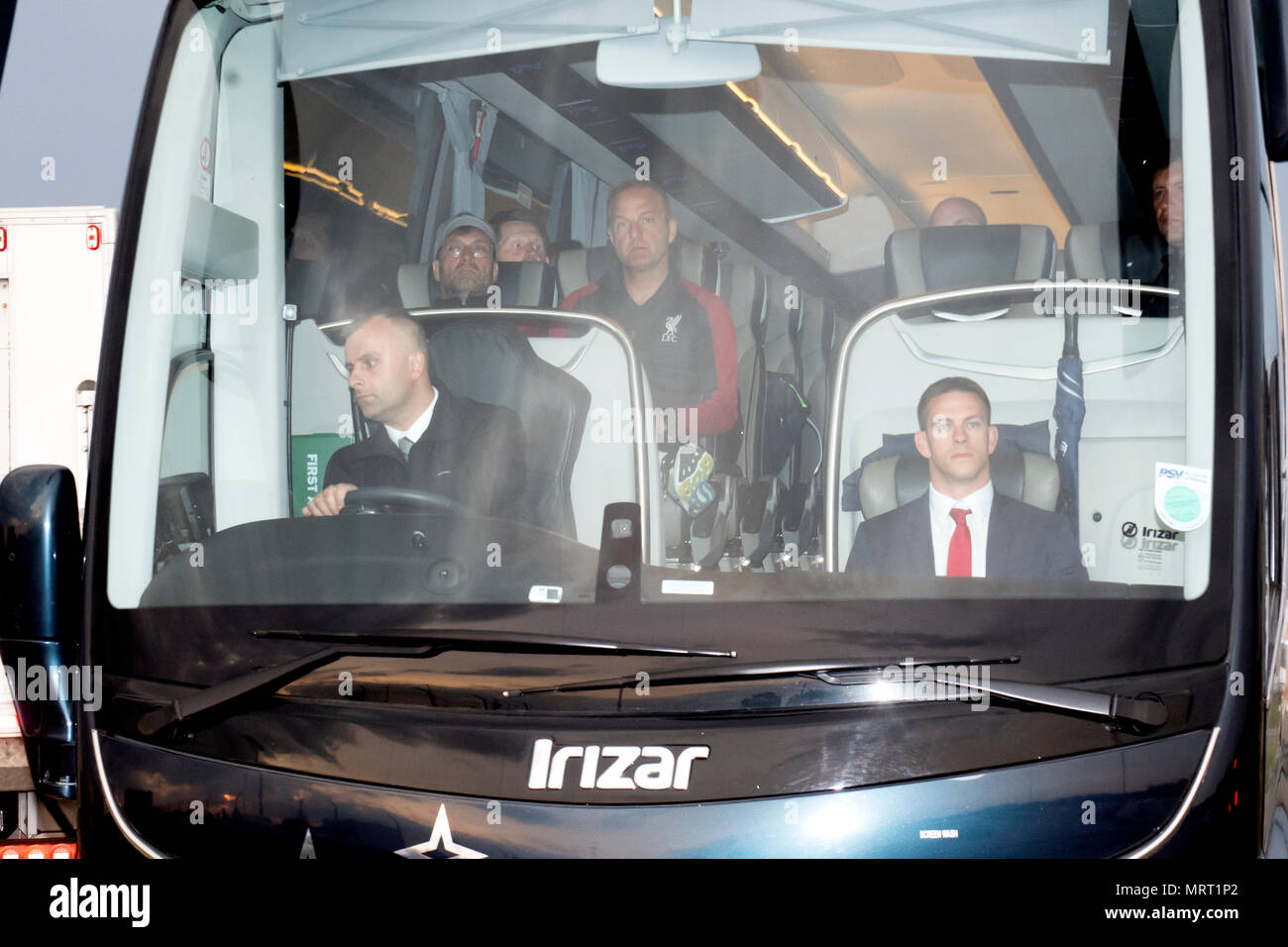 Liverpool manager Jurgen Klopp (top left) is seen through the team bus ...