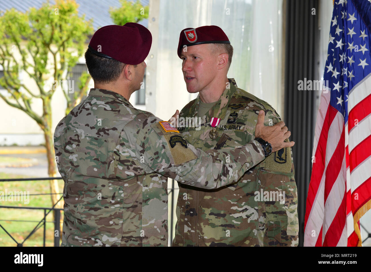 U. S. Army Paratrooper Col. Gregory K. Anderson (left), commander of ...