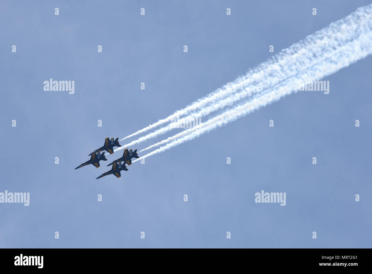 Four Blue Angels fly in a diamond formation at Stewart Air National ...