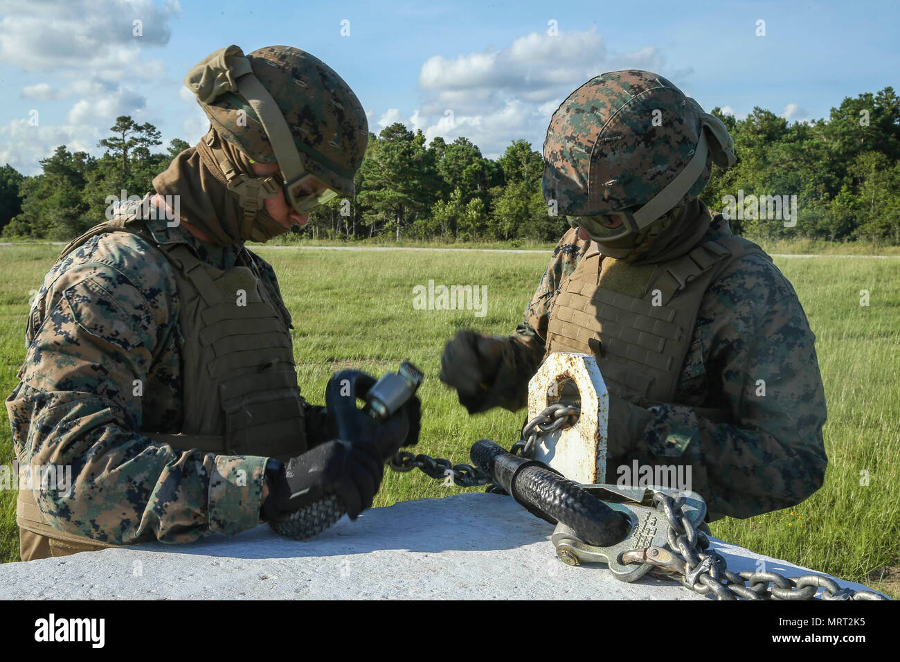 U.S. Marine Corps Pfc. Tristan Warnsley, left, and Pfc. Nathaniel ...