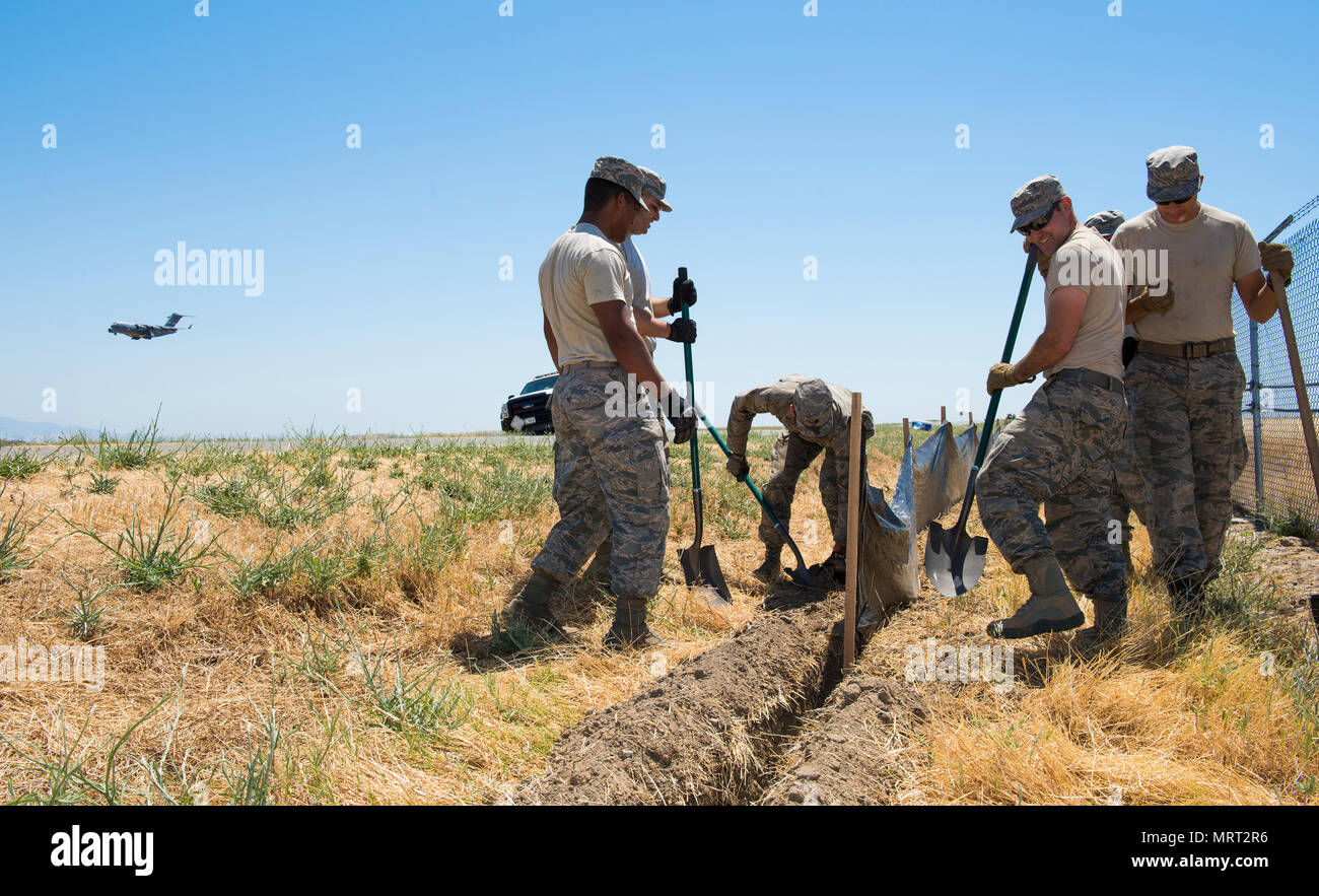 As temperatures exceed 100 degrees Fahrenheit, Airmen from the 60th ...