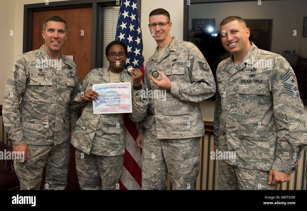 Col. John Klein, 60th Air Mobility Wing commander, and Chief Master Sgt ...