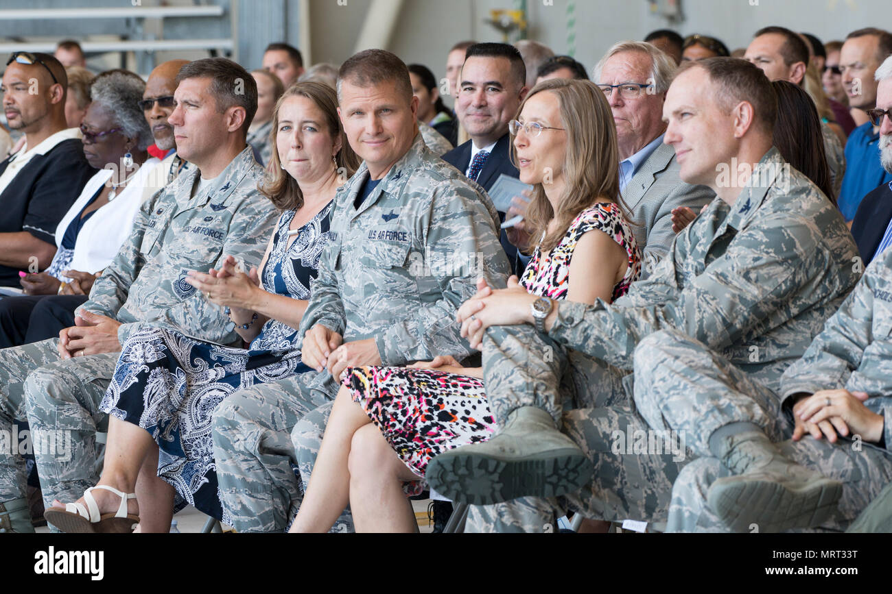 With three heavy-lift airships serving as a backdrop, family, friends ...