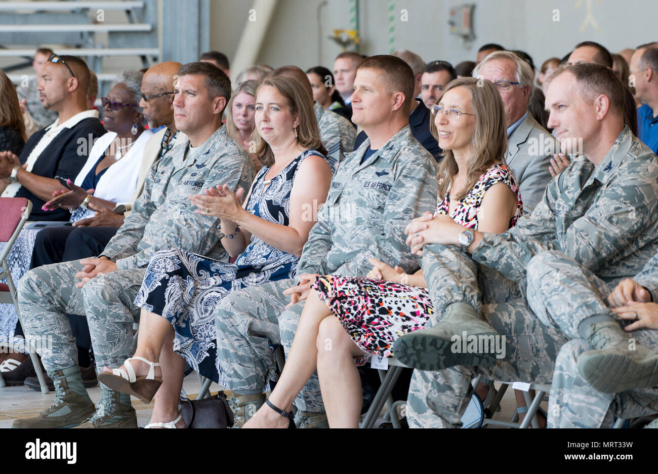 With three heavy-lift airships serving as a backdrop, family, friends ...