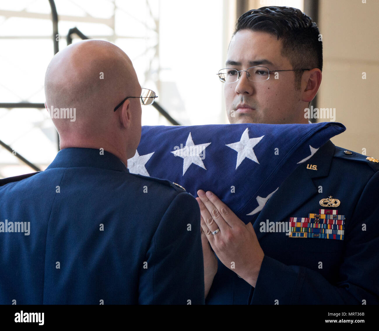With three heavy-lift airships serving as a backdrop, family, friends ...