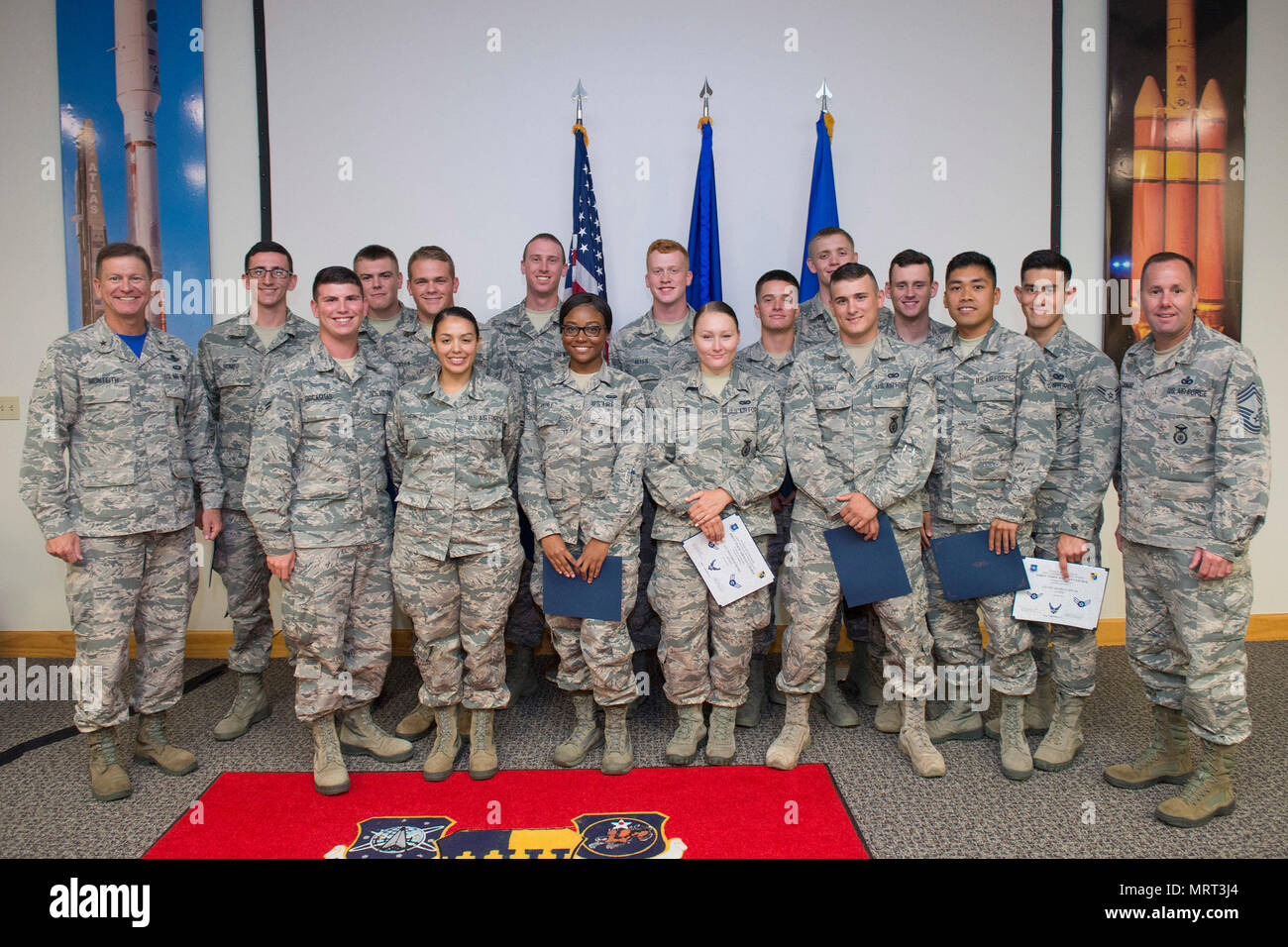 Fifteen Airmen who completed the first Airmanship 300 course pose for a ...
