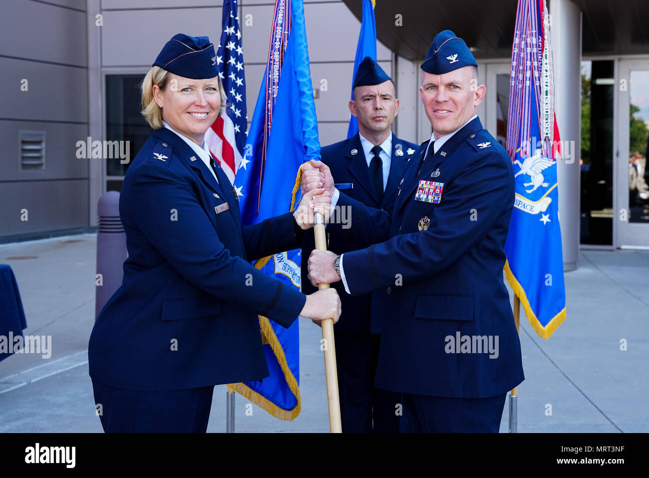 Col. DeAnna Burt, 50th Space Wing commander, passes the 50th Mission ...