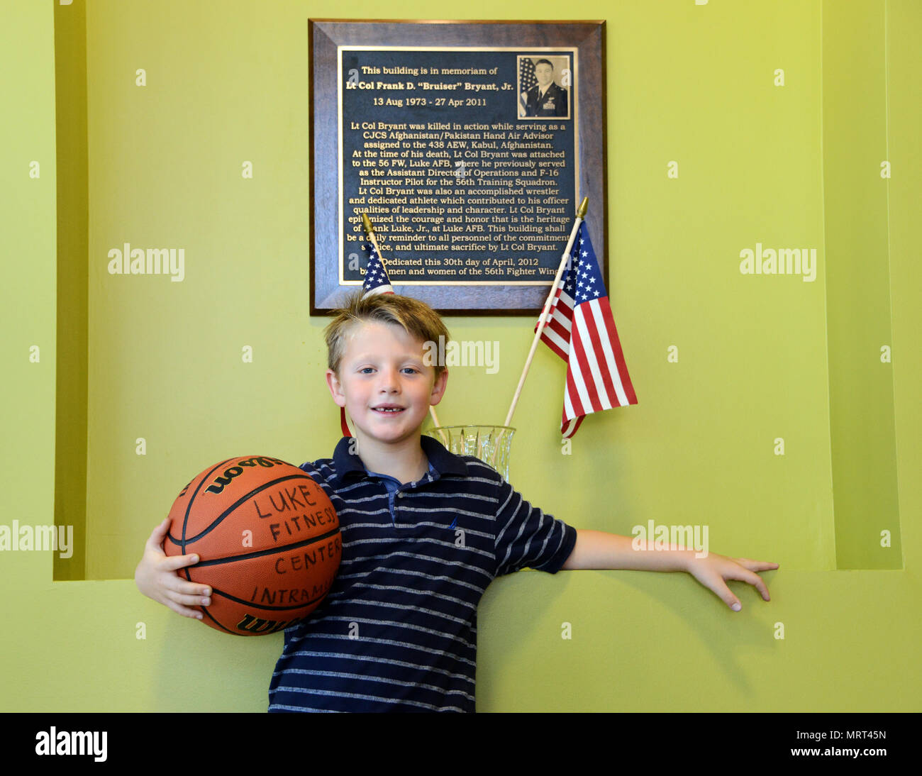 7-year-old Sean Luke, son of Frank Bryant Jr., poses for a picture in ...