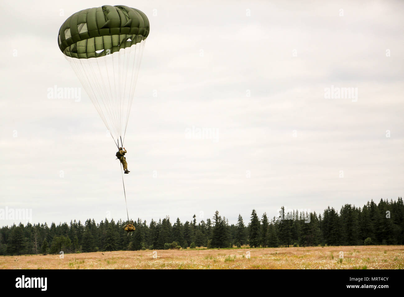 A Soldier in 1st Special Forces Group (Airborne) conducts airborne ...