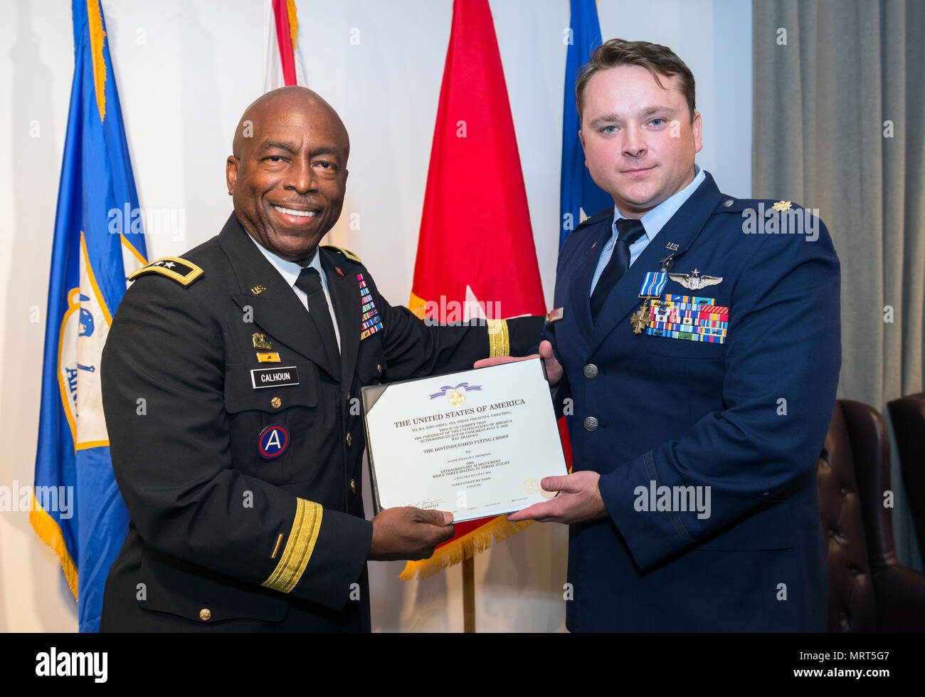 Maj. Gen. Michael Calhoun, the Adjutant General of Florida, presents ...