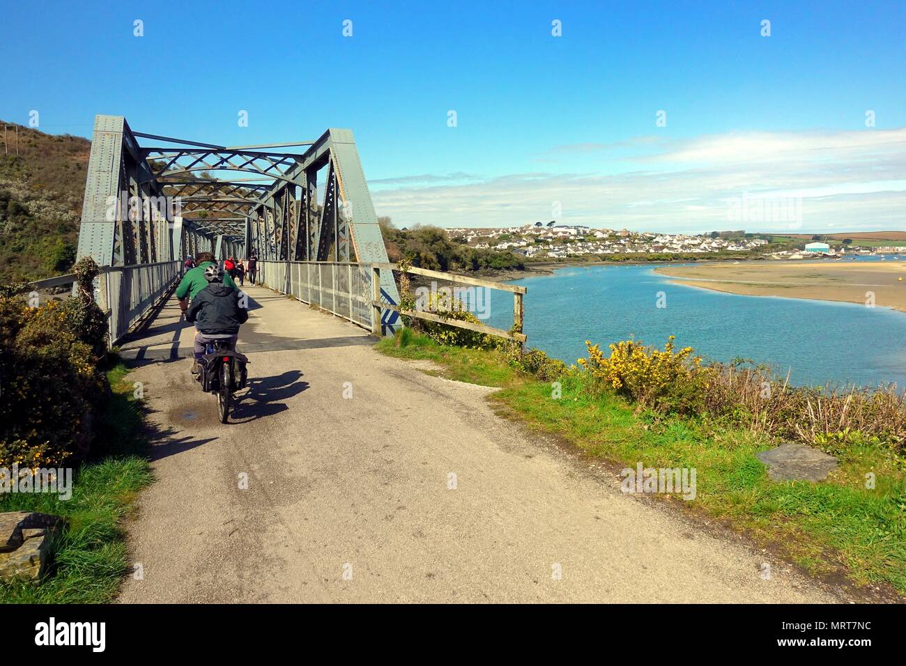 Camel Estuary, Cornwall, UK - April 11th 2018: Cyclists on the disused ...